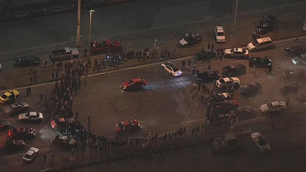PHOTOS: Dozens arrested at large sideshow in Oakland | abc7news.com PHOTOS: Dozens arrested at large sideshow in Oakland | abc7news.com