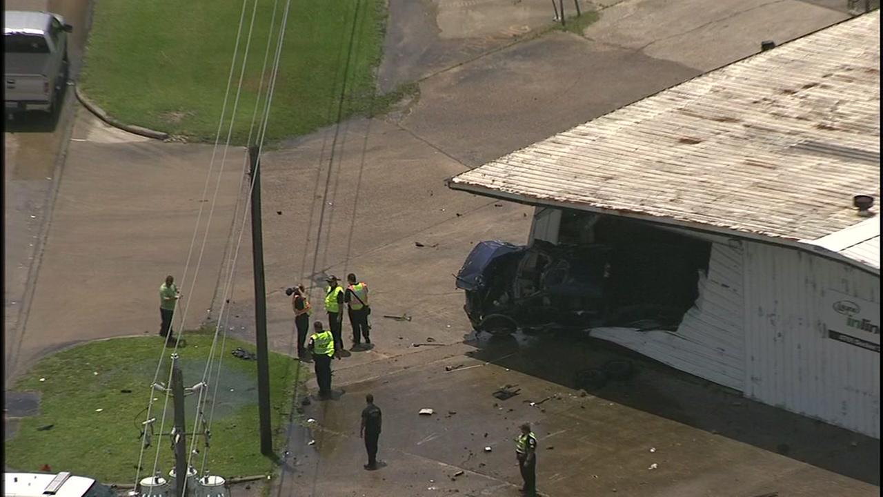 Driver Ejected From Truck After Crashing Into Building In Baytown
