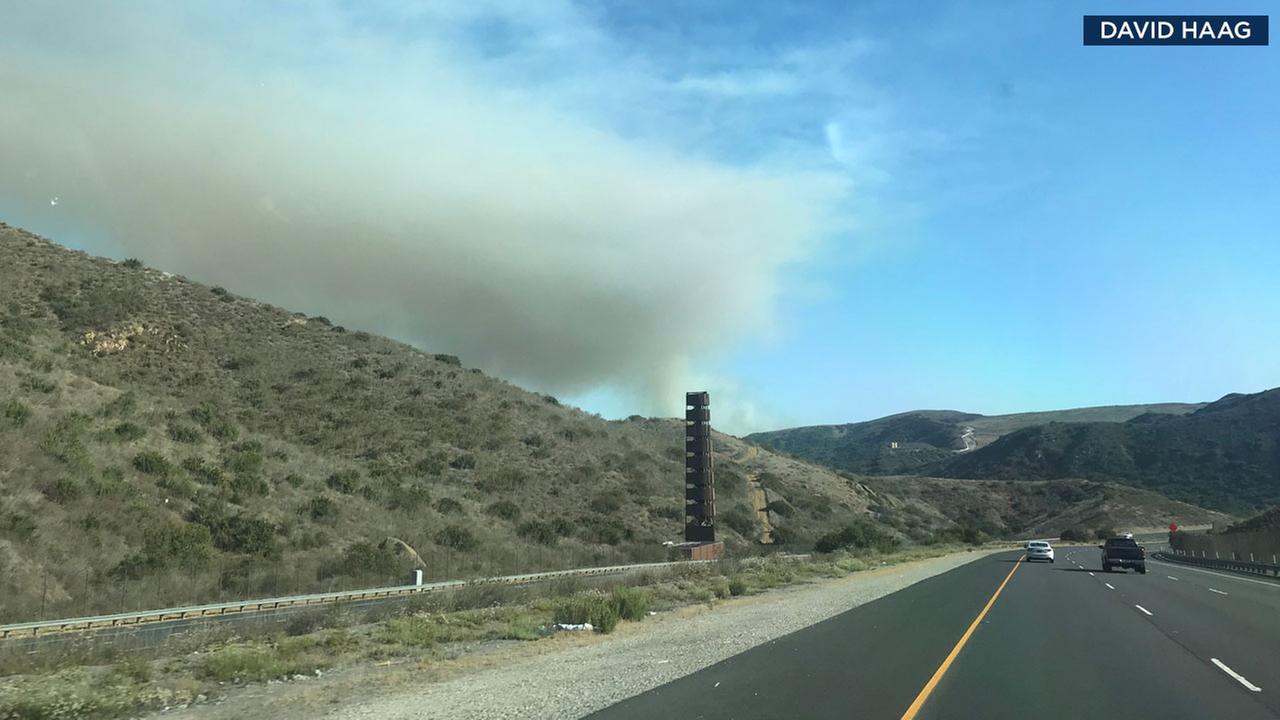 Fast-moving, wind-driven fire shuts down NB 241 toll road in Irvine ...