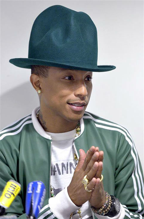 Pharrell Williams and one of Vivienne Westwood's Buffalo hats ...